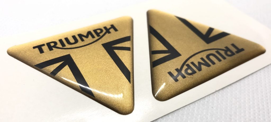 3D Triumph logo (Gold black) - 3D Logo Stickers